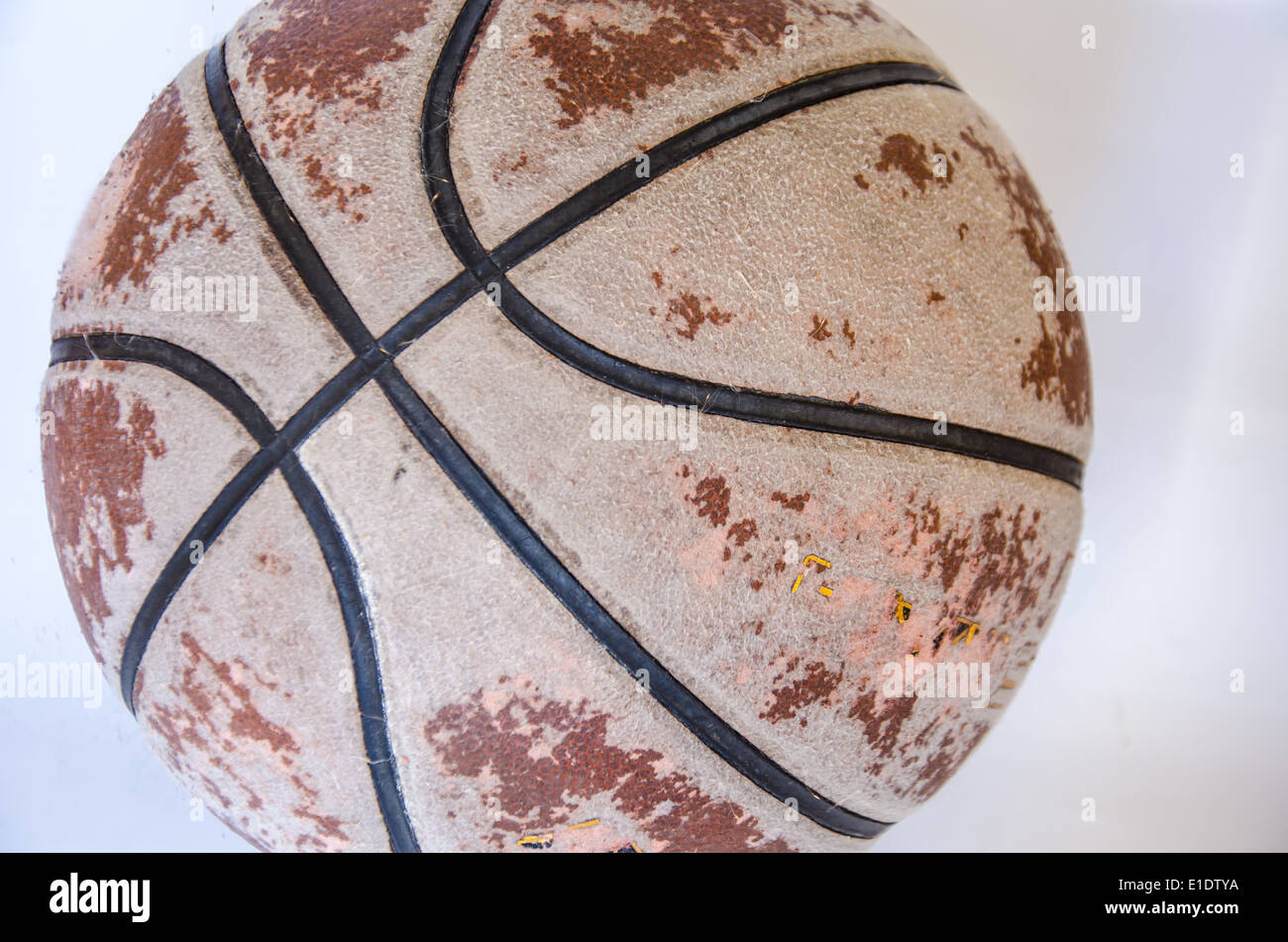old basketball on white background Stock Photo - Alamy
