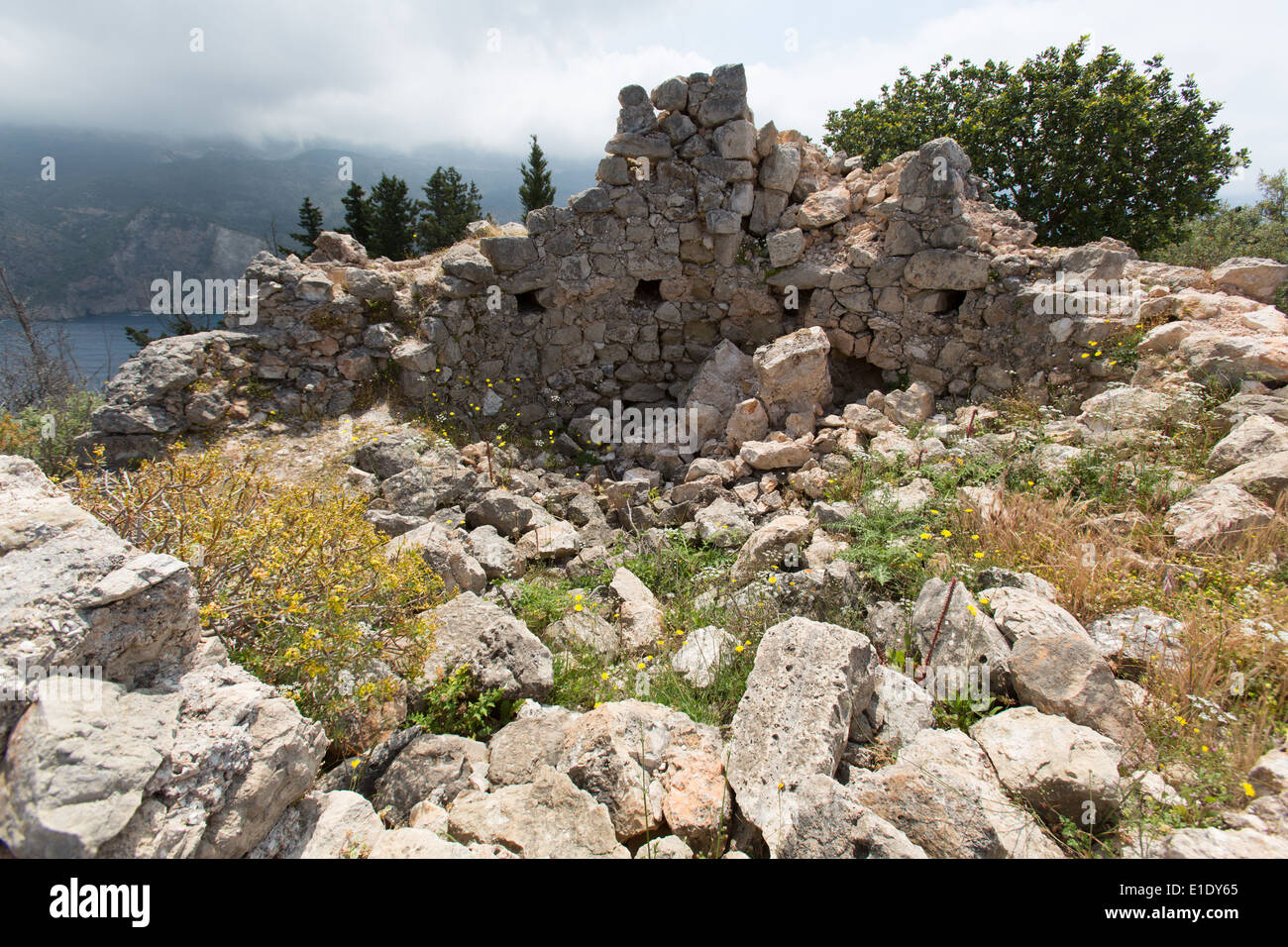 Village of Assos, Kefalonia. Crumbled ruins within Assos Castle, with ...