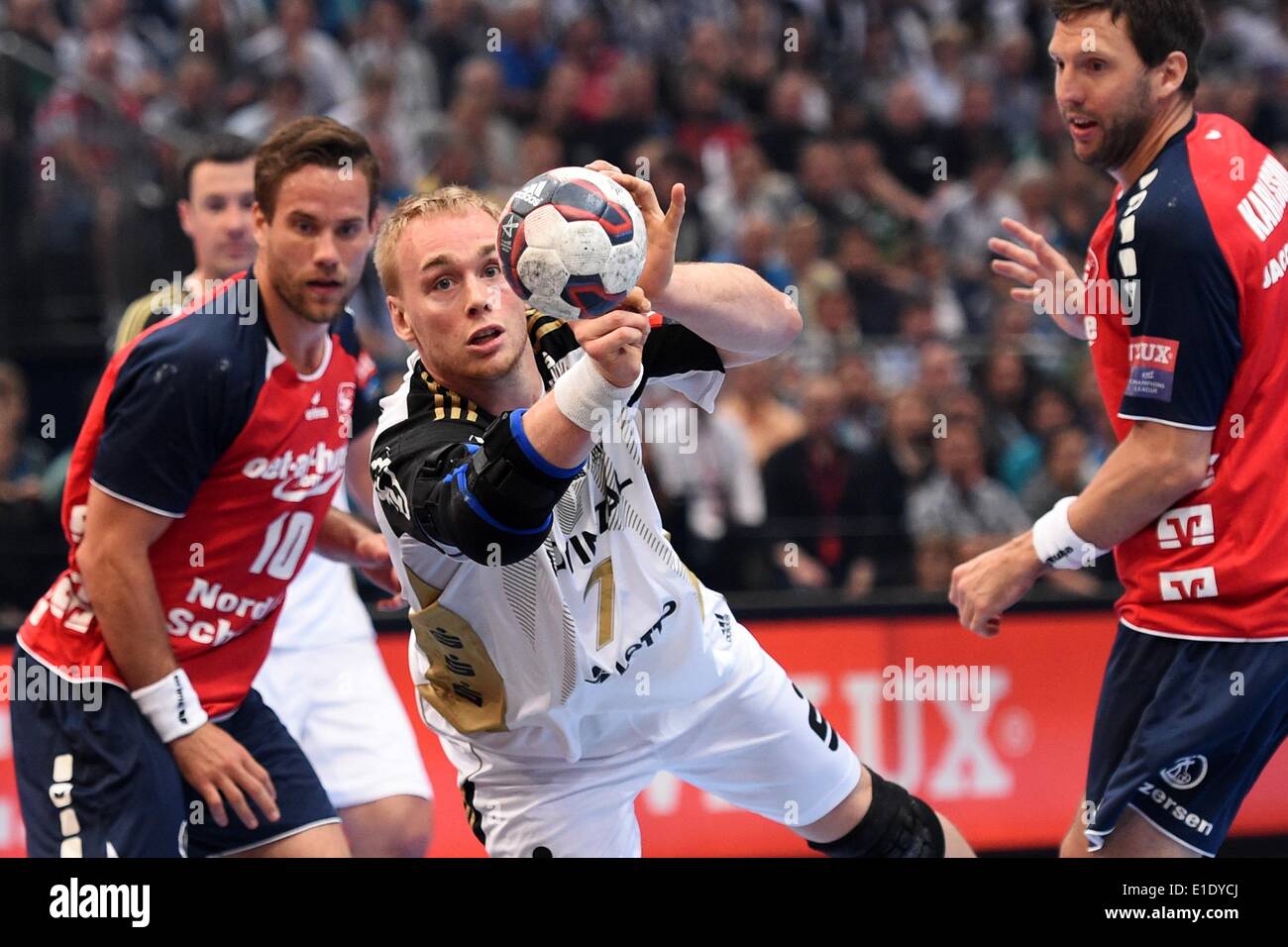 Cologne, Germany. 01st June, 2014. Kiel's Rene Toft Hansen (C) in ...
