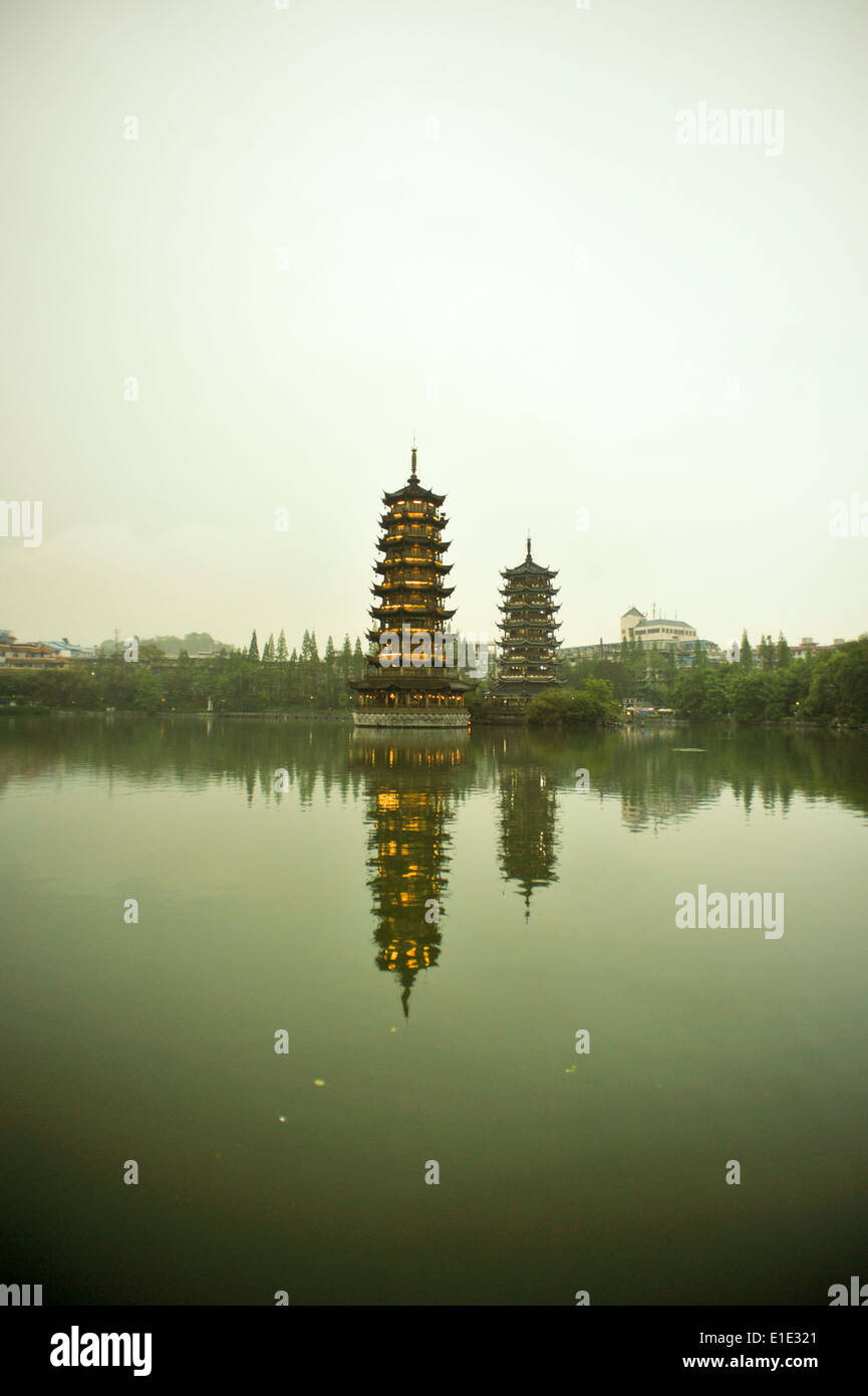 Sun and moon pagodas in Guilin at twilight Stock Photo - Alamy
