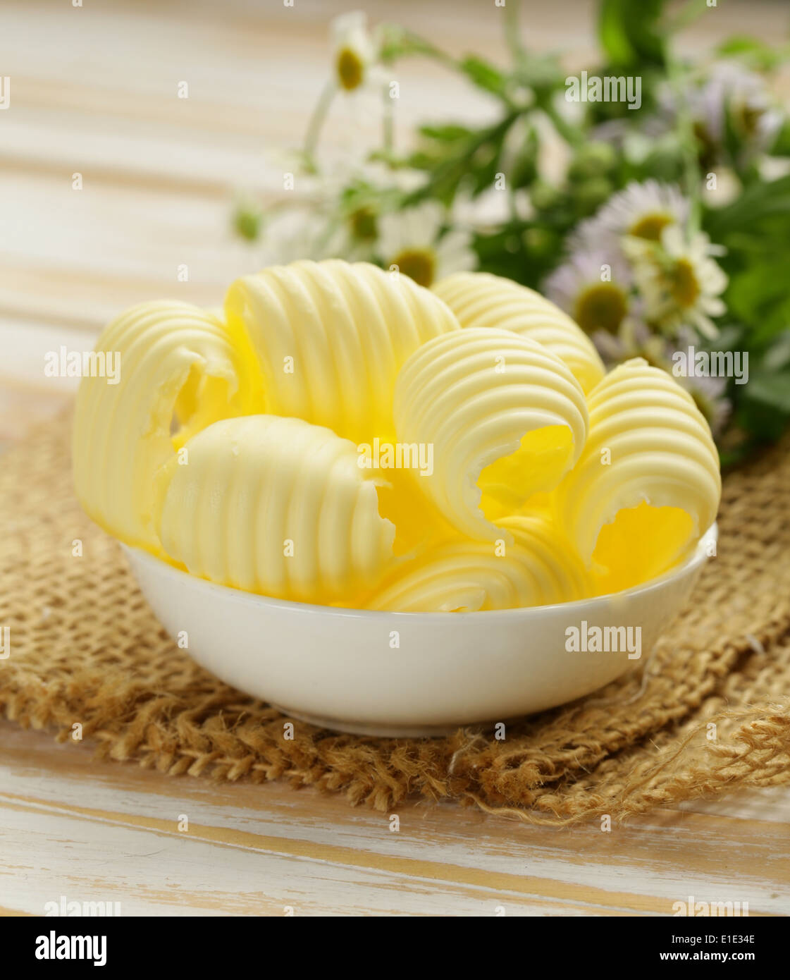 fresh yellow dairy butter in a white bowl Stock Photo - Alamy