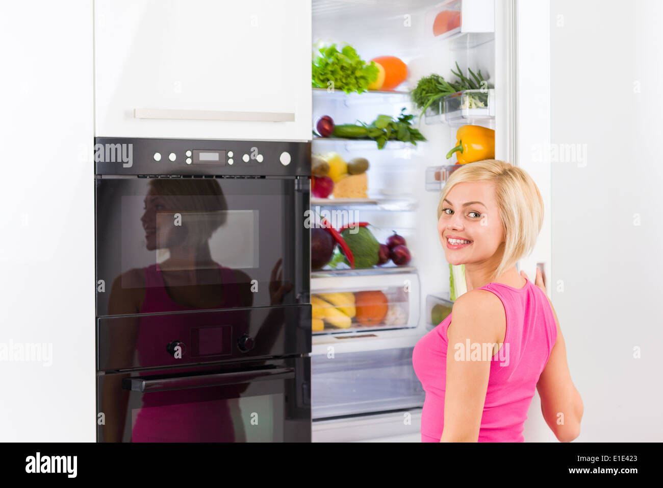woman refrigerator open door Stock Photo - Alamy