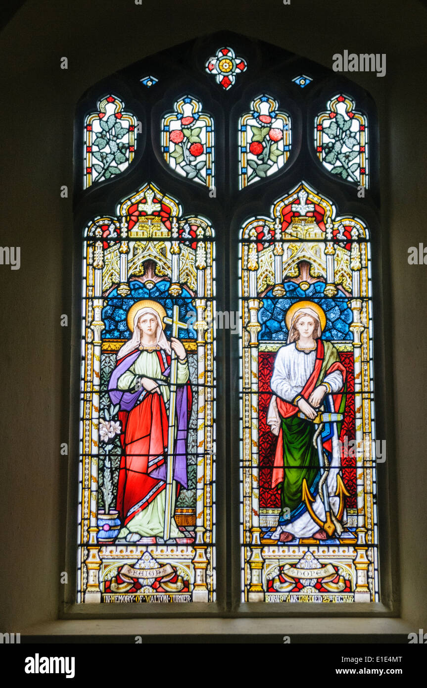 Stained glass windows depicting the virtues "Faith" and "Hope Stock ...