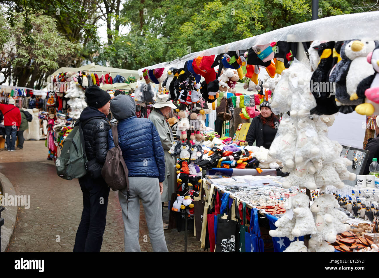 tourists walk around handicrafts market in plaza munoz gamero plaza de ...