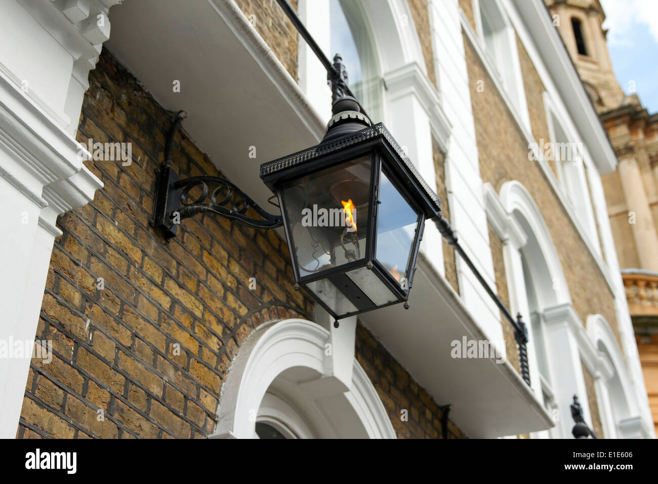 Brick Homes with oil burning Light Stock Photo - Alamy