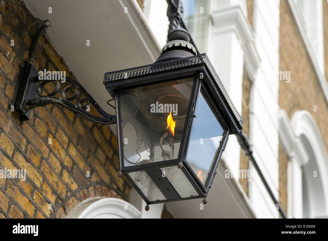 Brick Homes with oil burning Light Stock Photo - Alamy