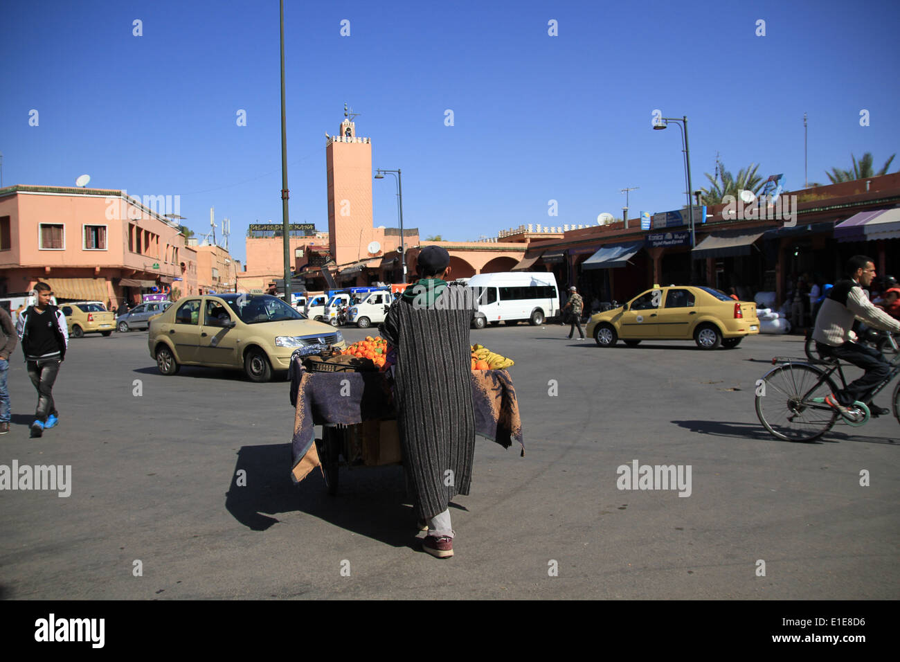 Man pushing a cart in the Djemaa el Fna square, Marrakech, Morocco Stock Photo - Alamy