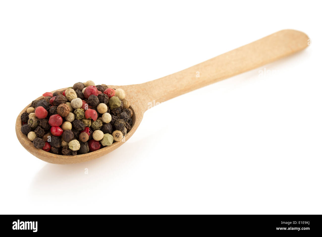 pepper in spoon isolated on white background Stock Photo - Alamy