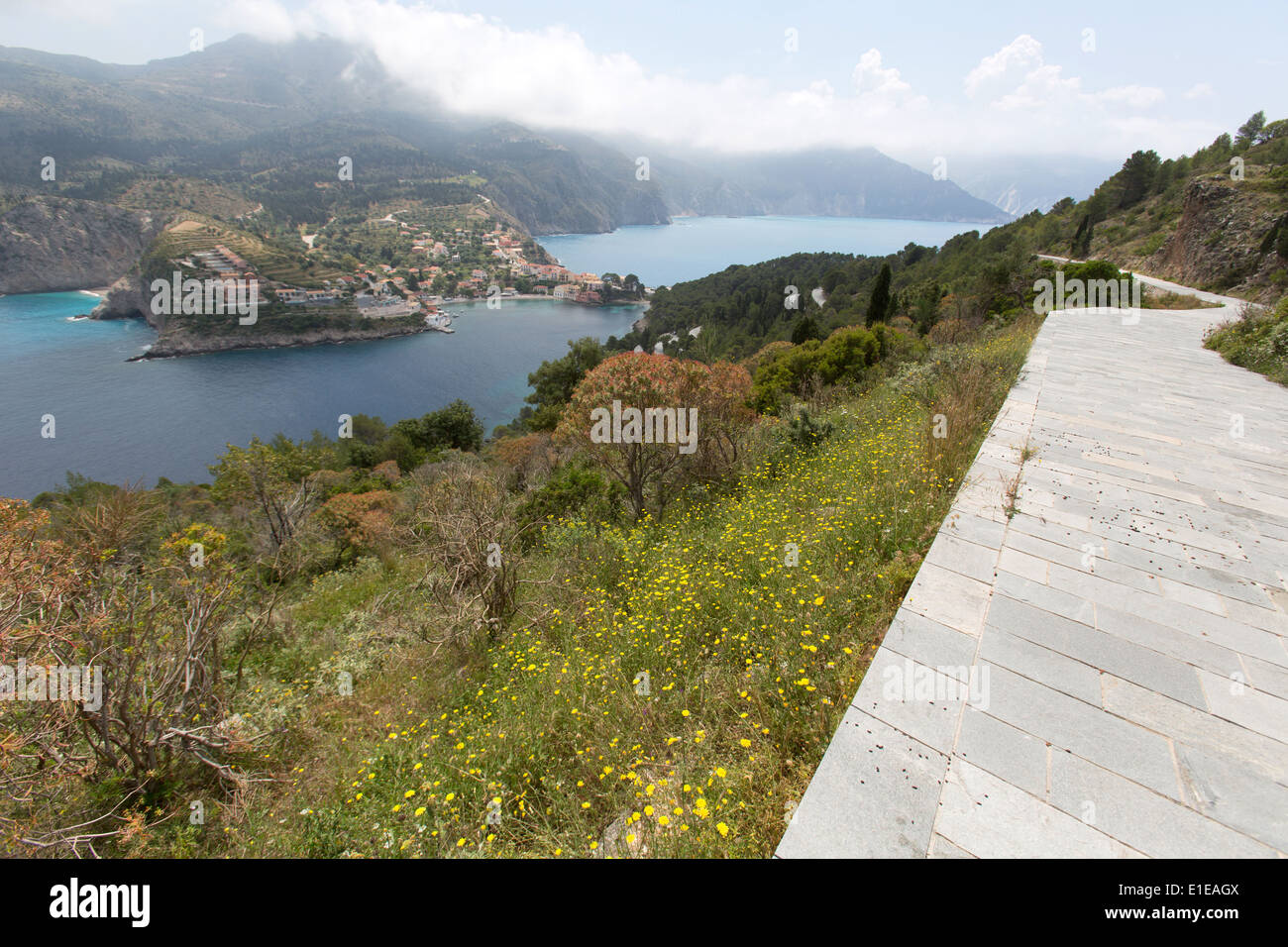 Village of Assos, Kefalonia. Path leading from Assos Castle on a cloudy ...