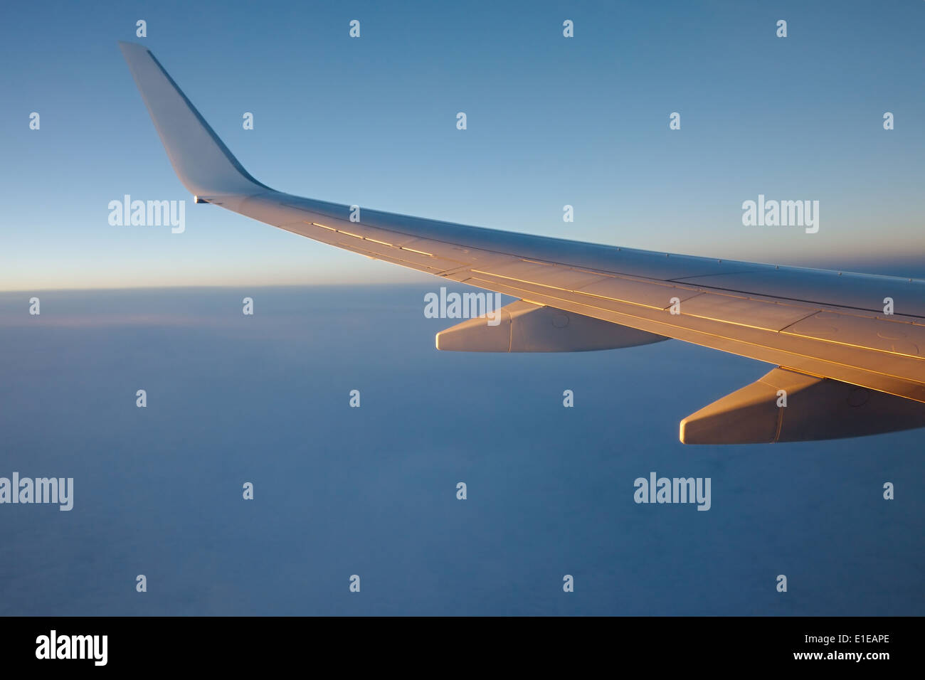 Red airplane flying above hi-res stock photography and images - Alamy