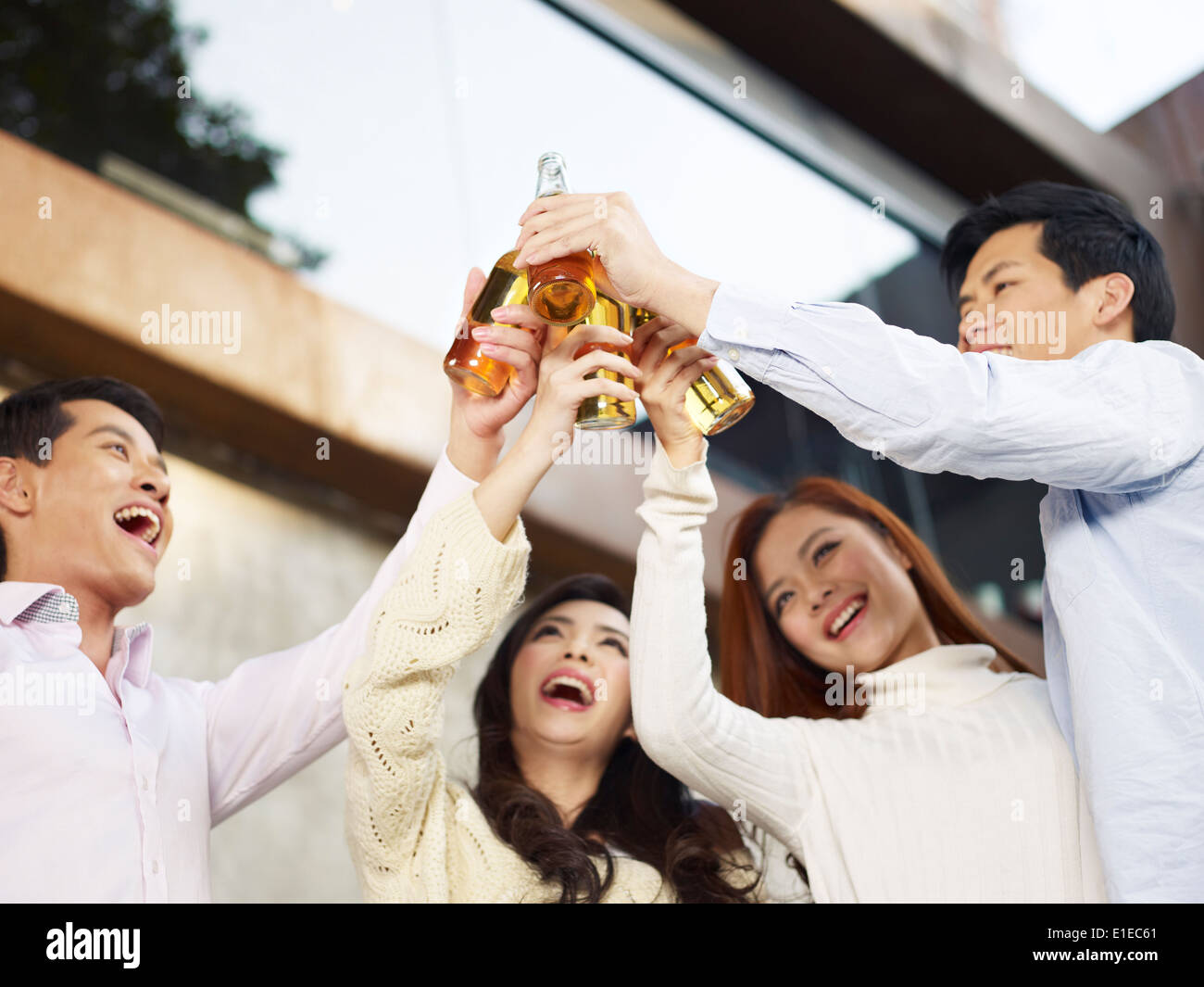 Toasting with bottles hi-res stock photography and images - Alamy