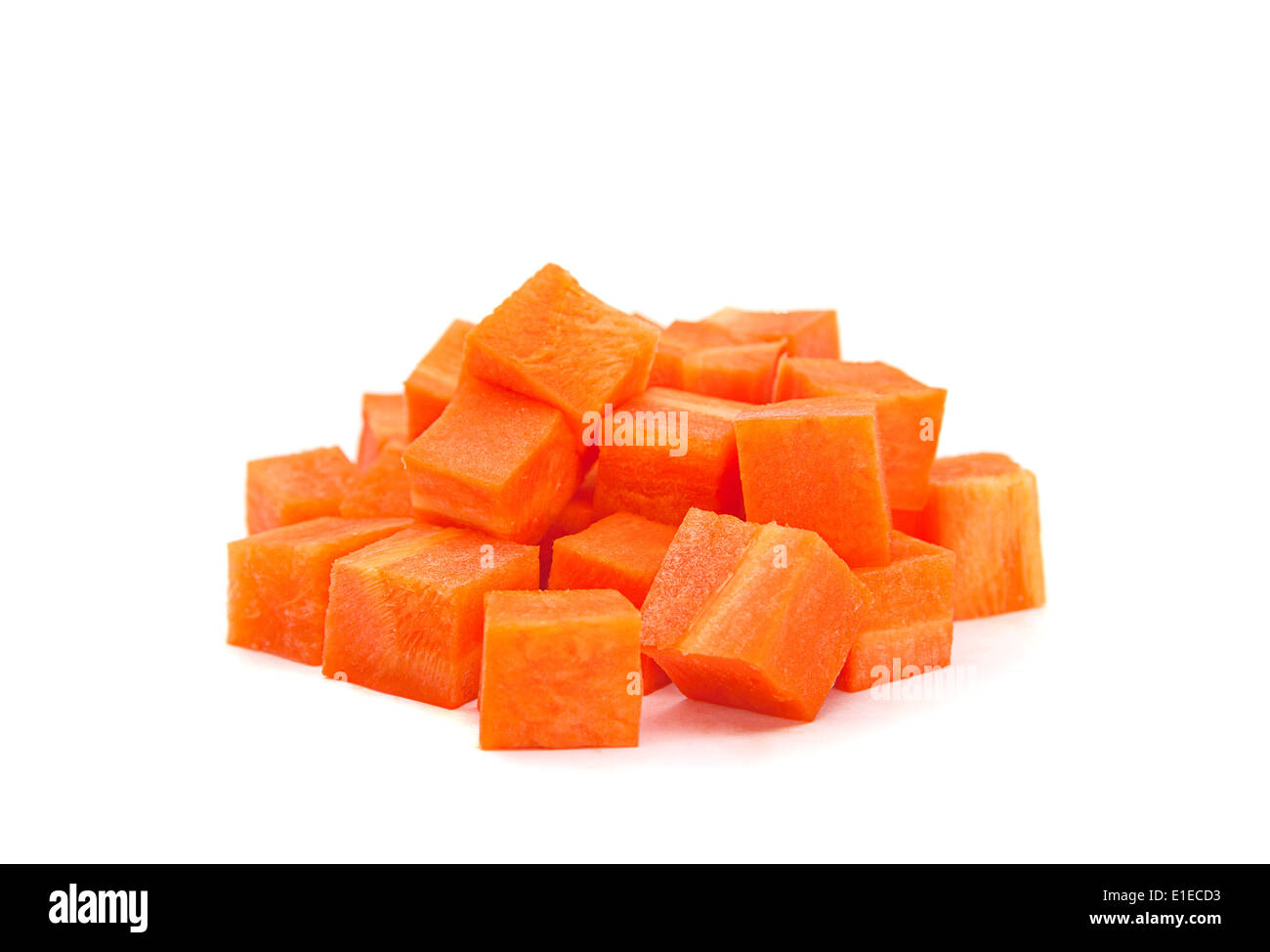 Carrot cube vegetable isolated on white background Stock Photo - Alamy