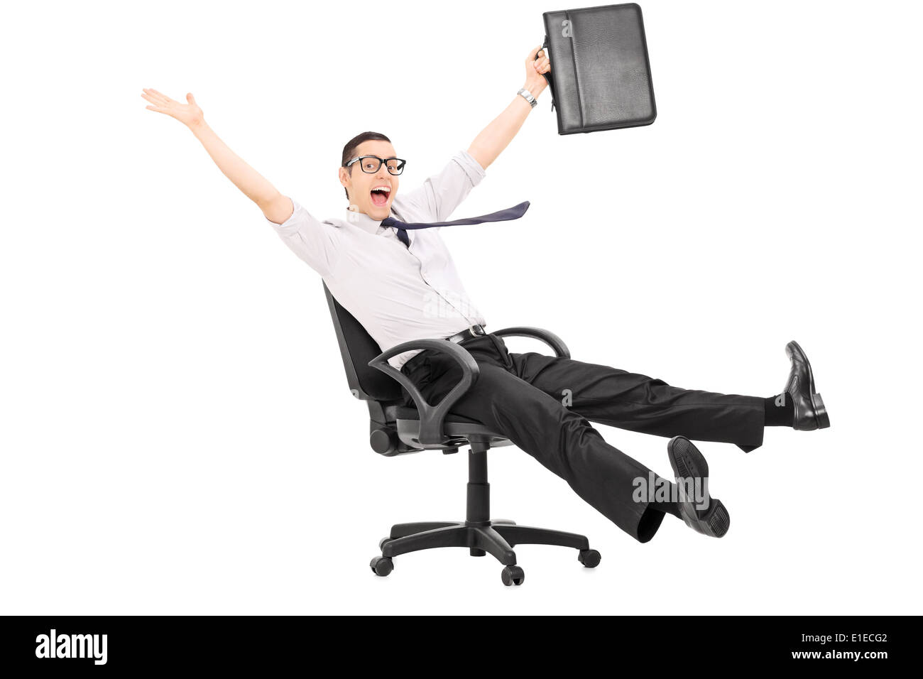 Young guy and an office chair hi-res stock photography and images - Alamy