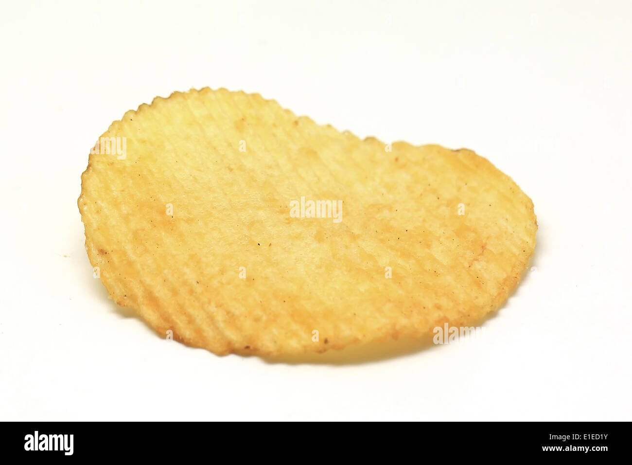 potato crisps isolated on white background Stock Photo - Alamy