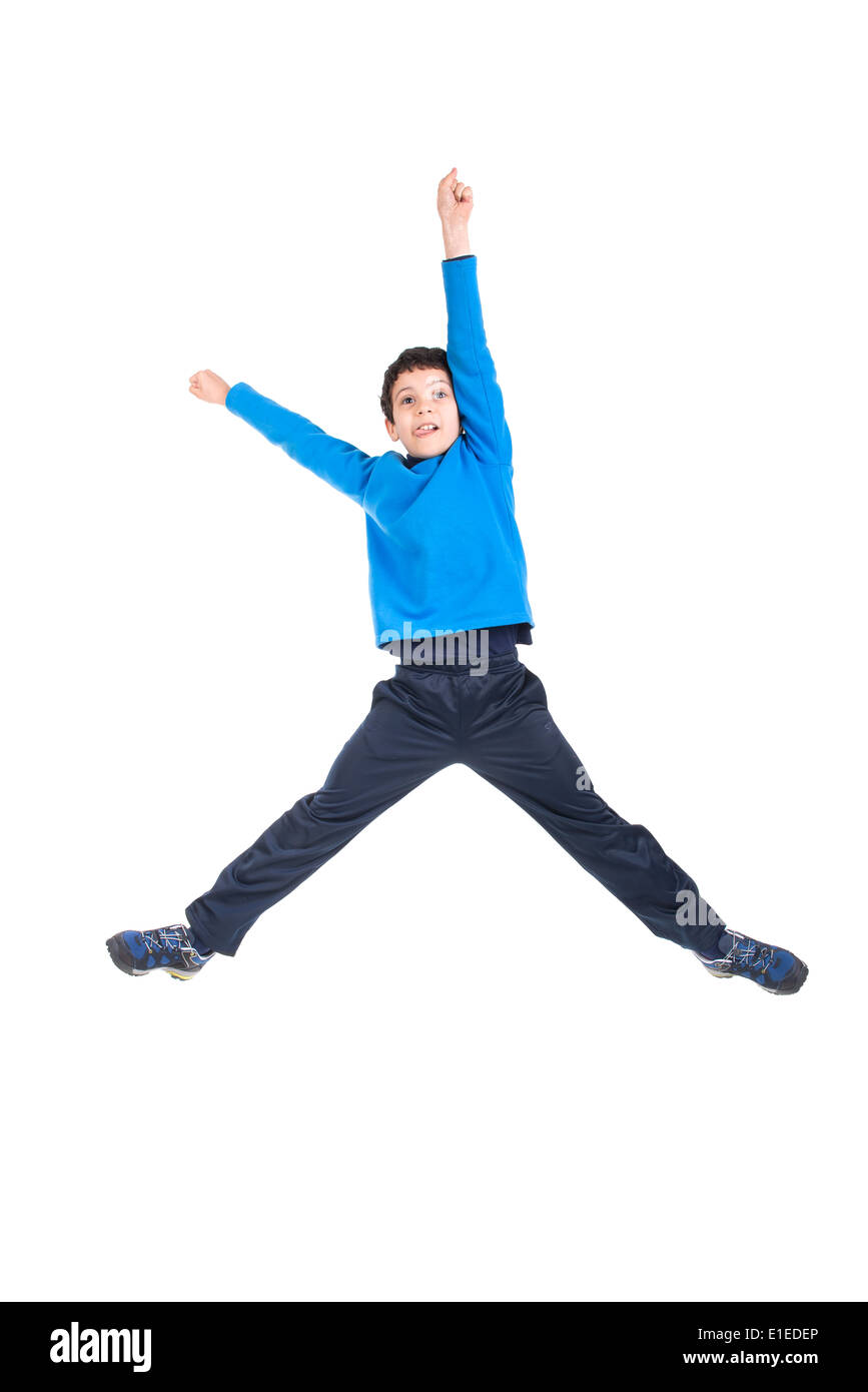 Young boy jumping isolated in white Stock Photo - Alamy