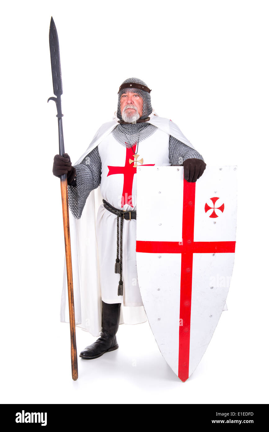 Knight Templar posing with shield and spear isolated in white Stock ...