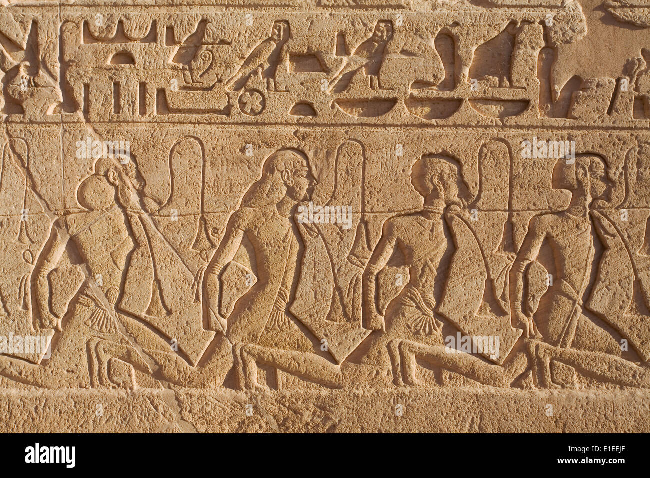 Fragment of stone relief illustrating slaves of Pharaoh at temple of ...