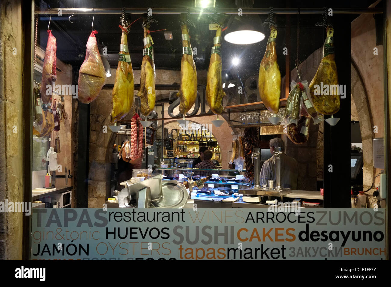 A wide selection of hams from different origins decorates a restaurant ...