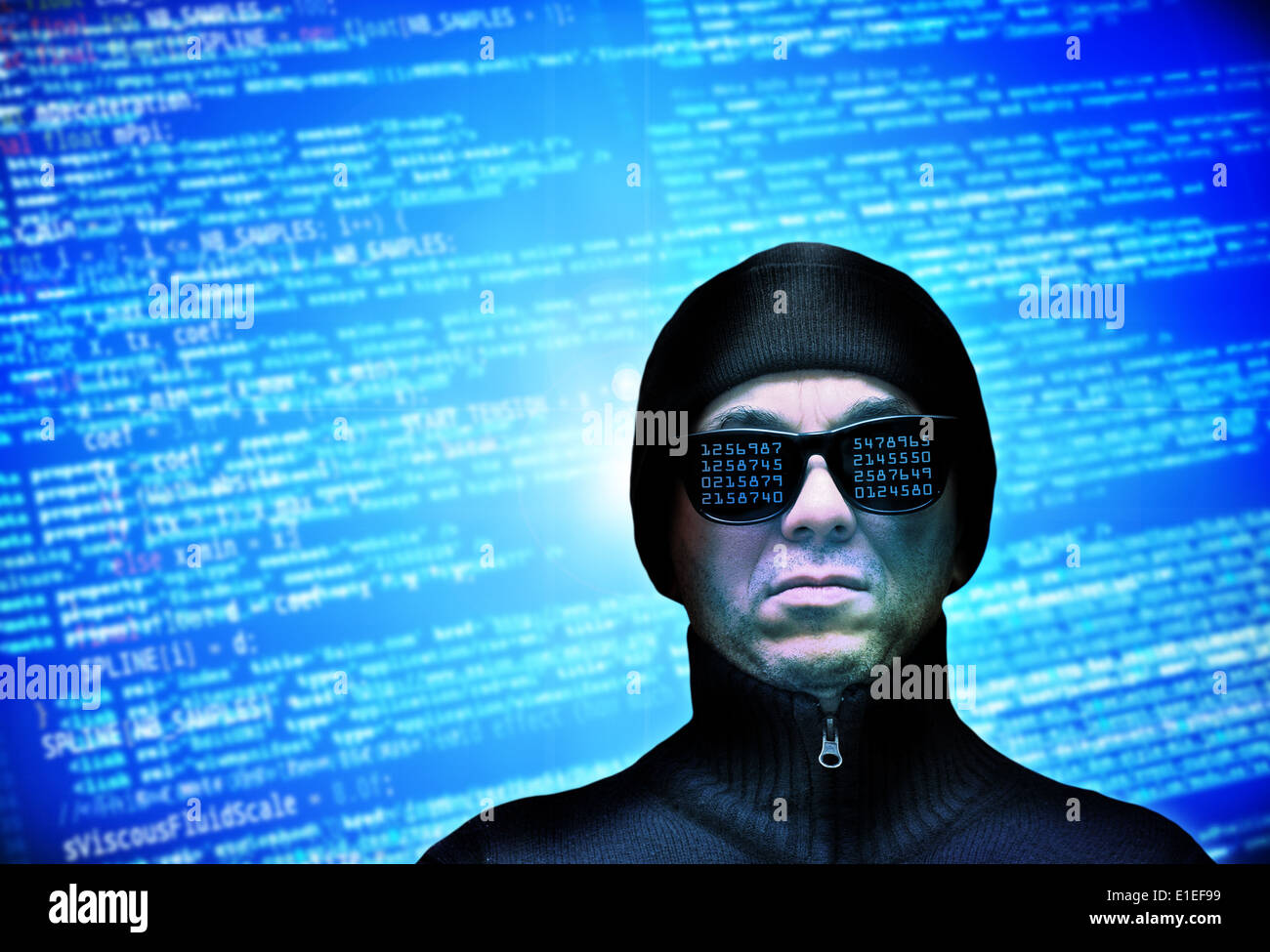 hacker in front of a background of code Stock Photo - Alamy
