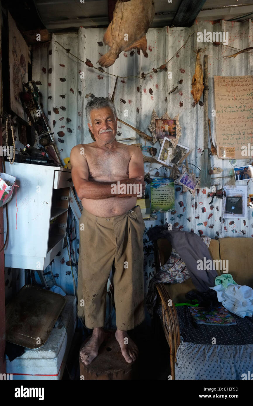 A fisherman posing at the Israeli Arab town of Jisr az Zarqa or Gisr a ...