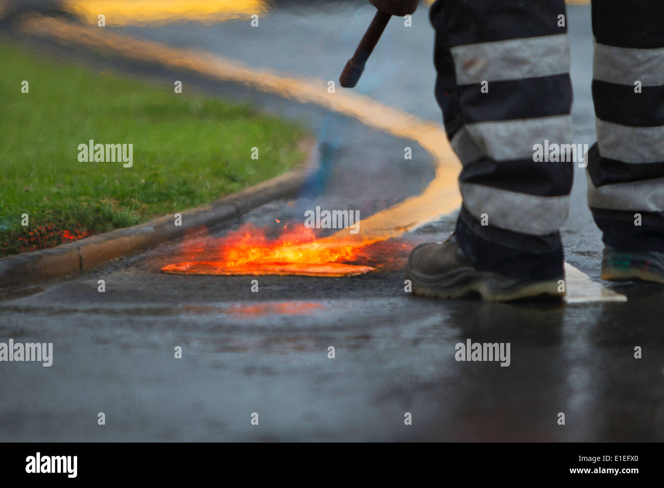Pouring yellow paint High Resolution Stock Photography and Images - Alamy