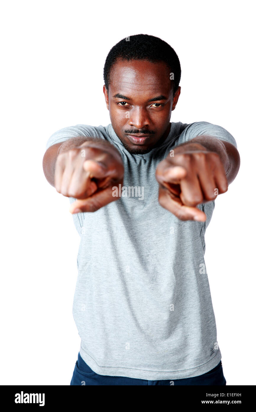 Handsome african man pointing at you over white background Stock Photo ...