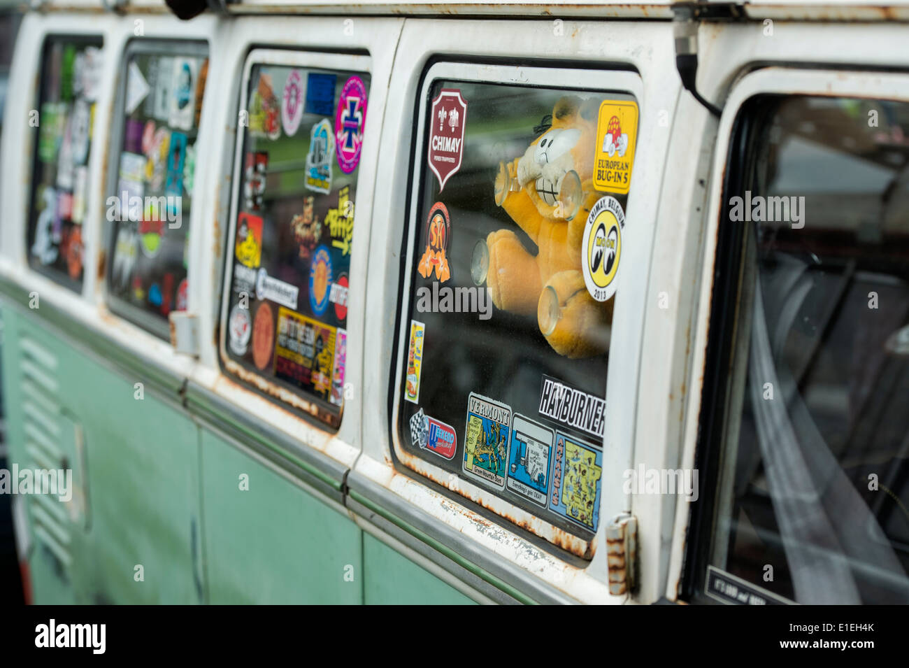 VW Volkswagen camper van covered in stickers at a VW show. England ...