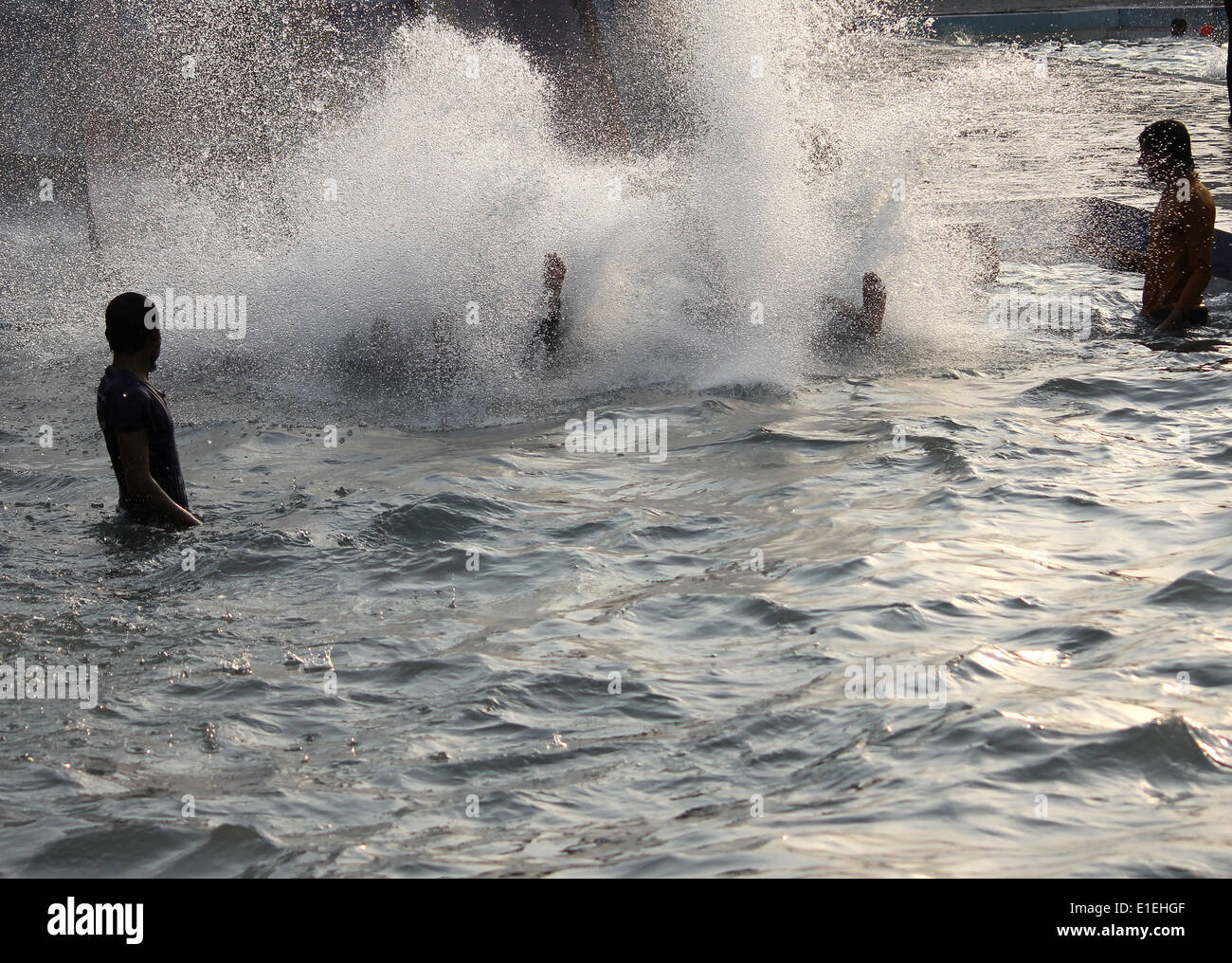 Lahore, Pakistan. 01st June, 2014. Pakistani youngster jumping and ...