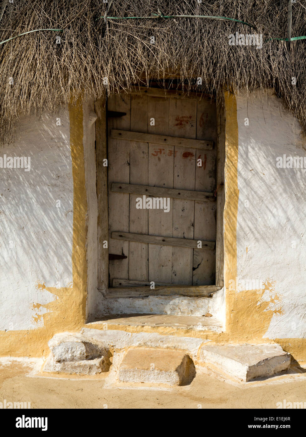 India, Rajasthan, Jaisalmer, door of thatched Guest House of Thar ...