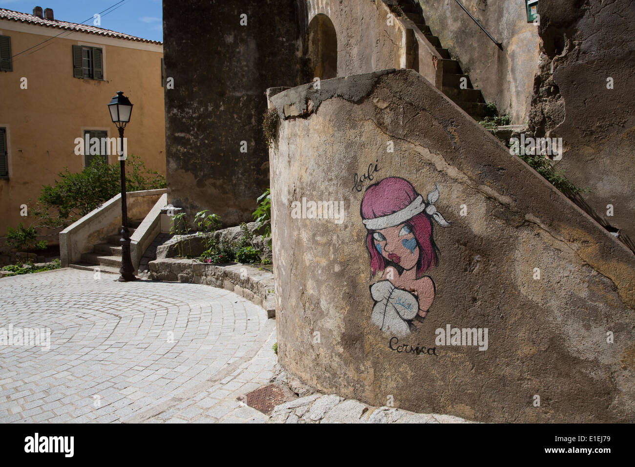 Graffiti on a wall in the historic Citadel in the town of Calvi ...