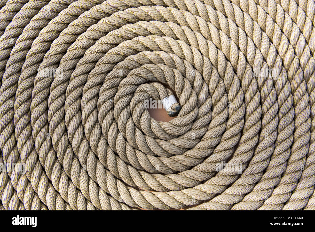 Roll of a rough strong ship rope background pattern Stock Photo - Alamy