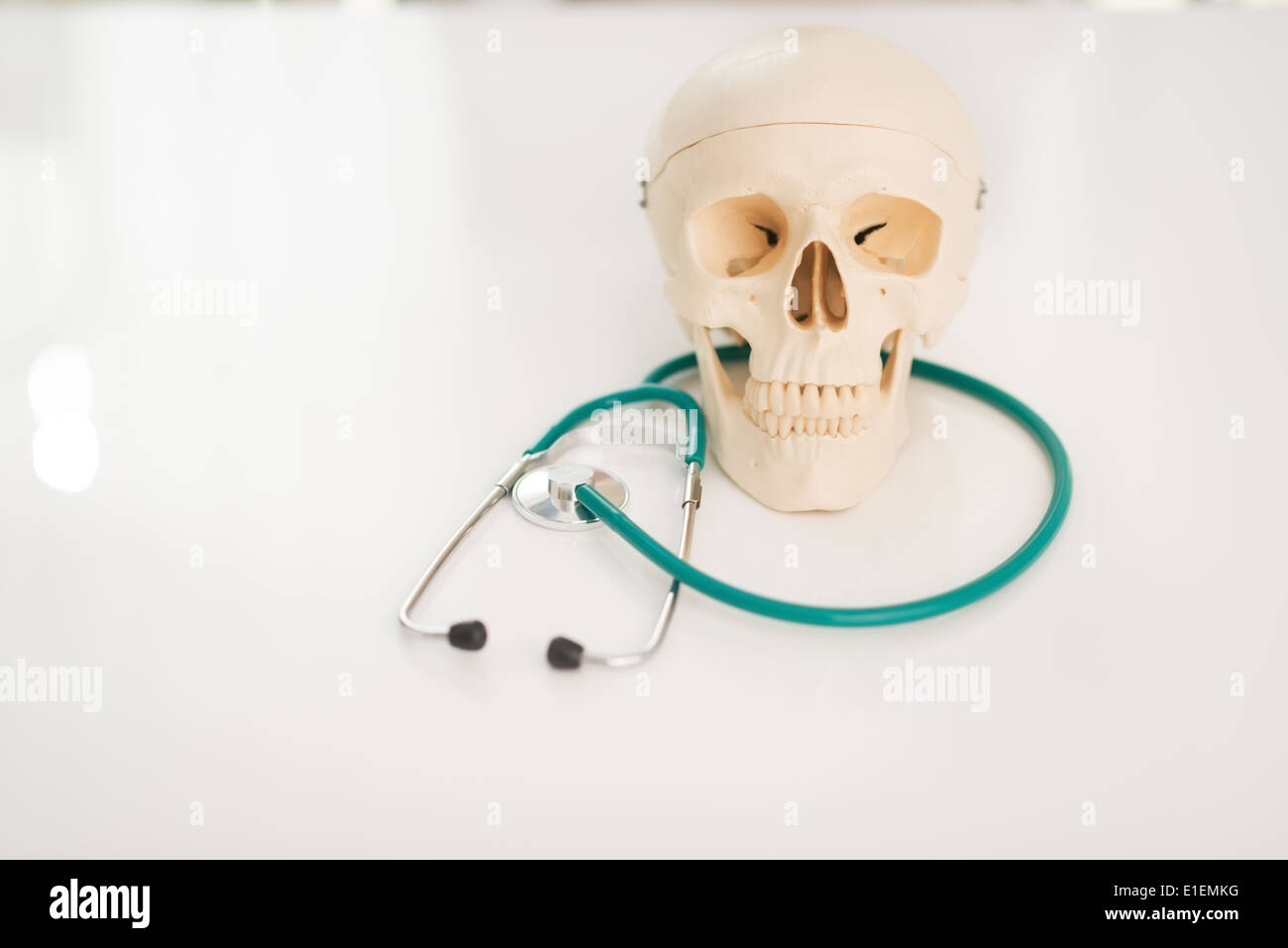 Closeup on human skull and stethoscope Stock Photo - Alamy