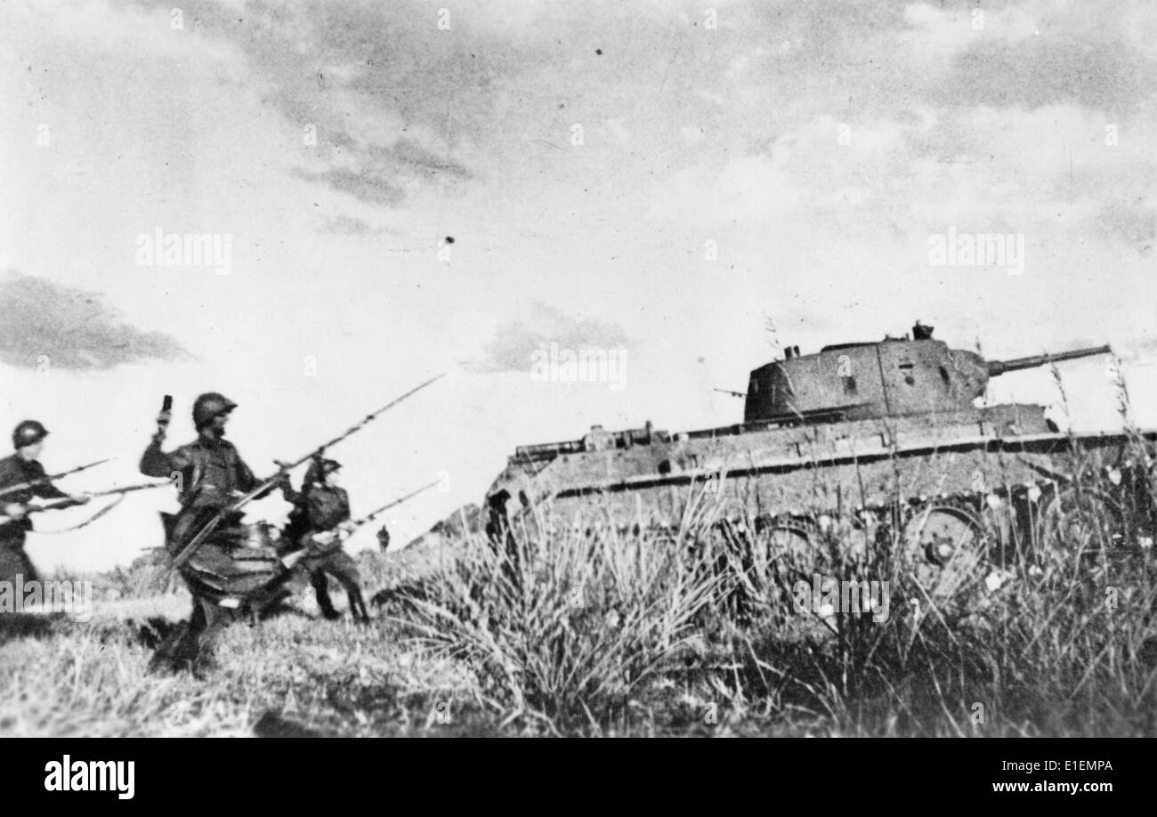 Soviet soldiers and tanks during combat at the front, location and date ...