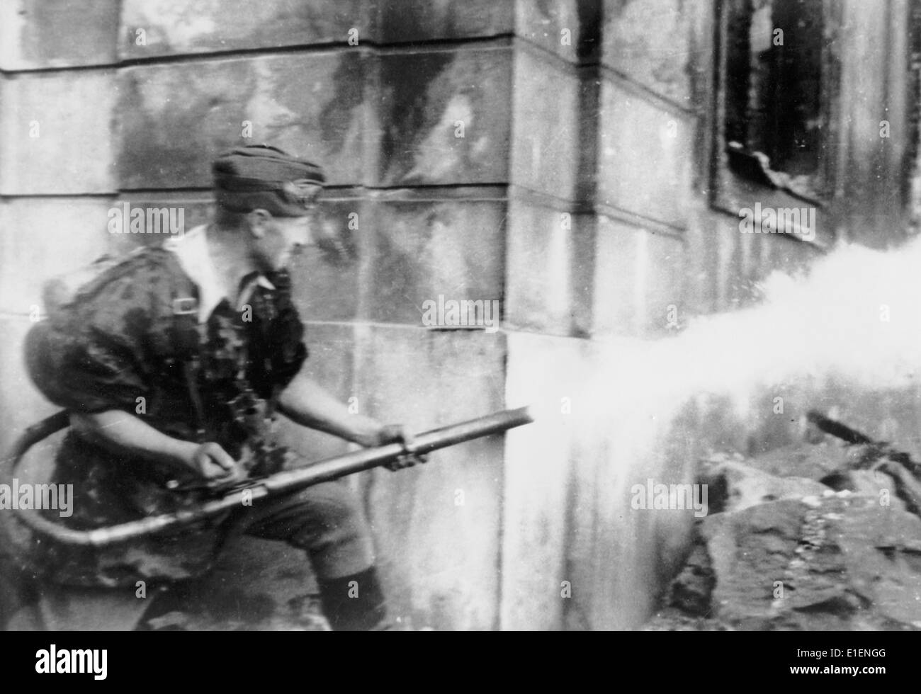 A German soldier with a flame thrower during an urban battle on the ...