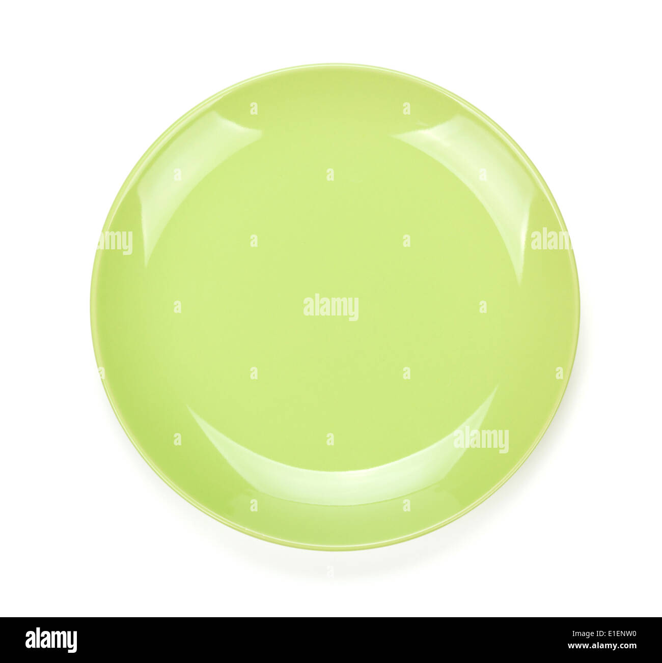 Empty green plate. Isolated on white background Stock Photo - Alamy
