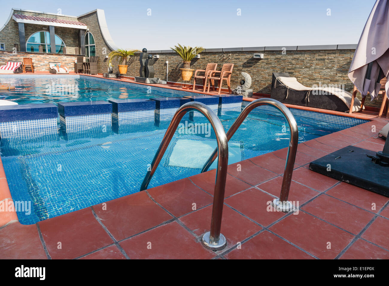 Poolside rooftop hi-res stock photography and images - Alamy