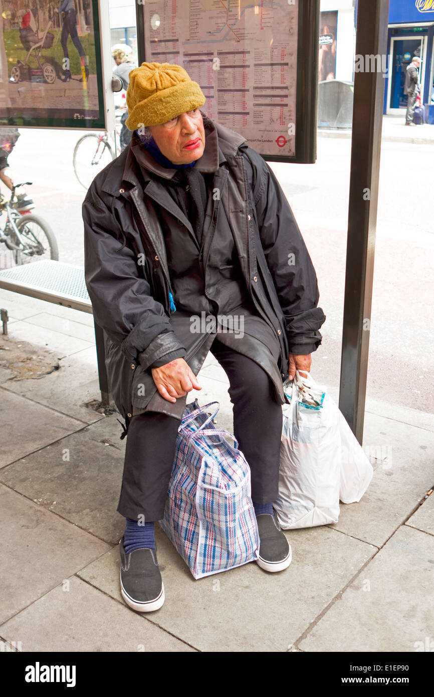 Elderly lady and bus stop hi-res stock photography and images - Alamy