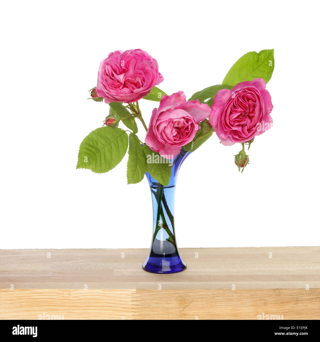 Roses vase table arrangement hi-res stock photography and images - Alamy