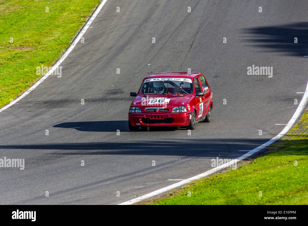 Red MG going down the hill at Oulton Park race track Stock Photo - Alamy