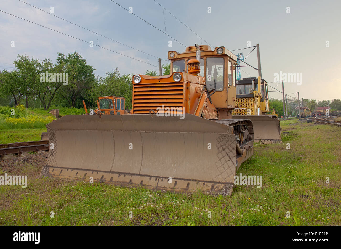 Bulldozers building the railway track Stock Photo - Alamy