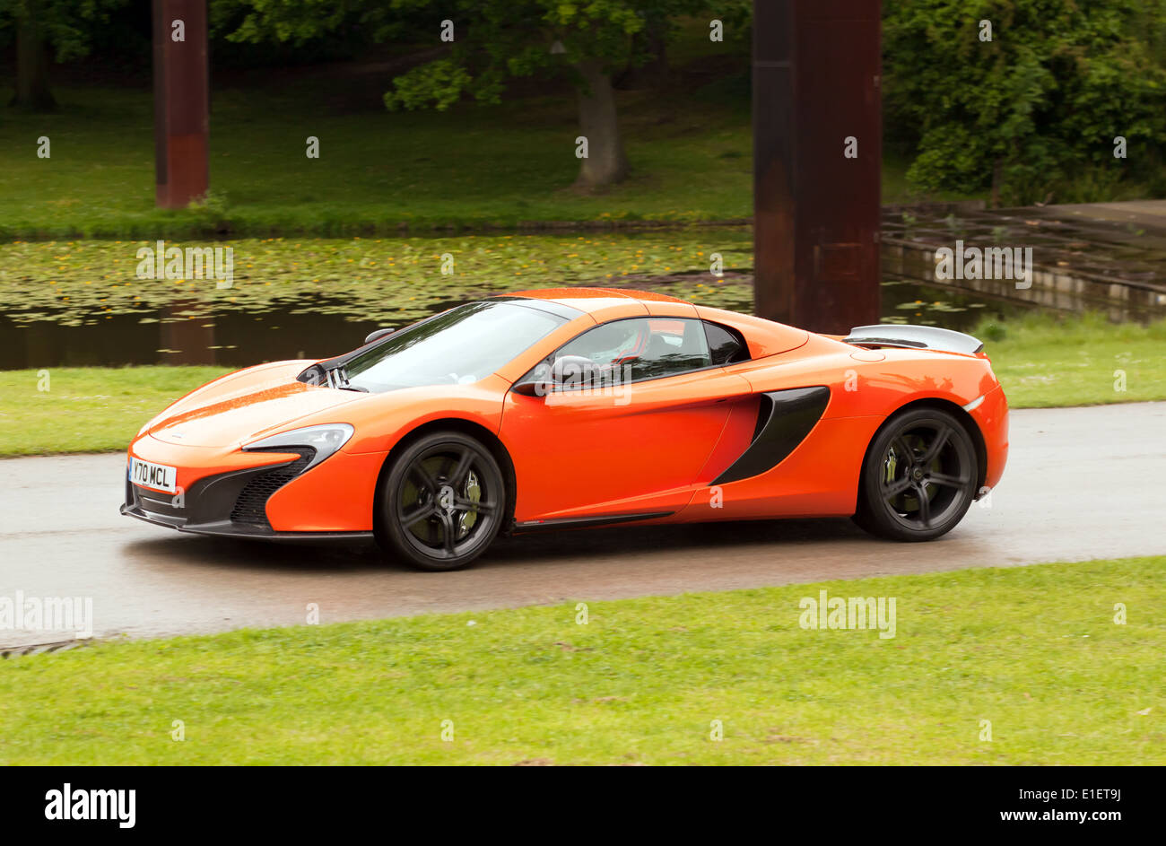 A McLaren 12C Spider Super Sports Car being demonstrated at motorsport ...