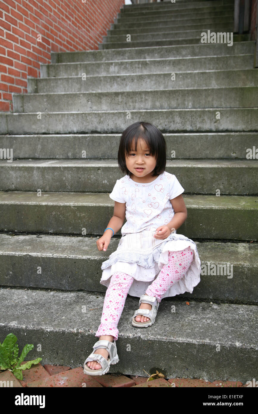 girl on staircase Stock Photo - Alamy