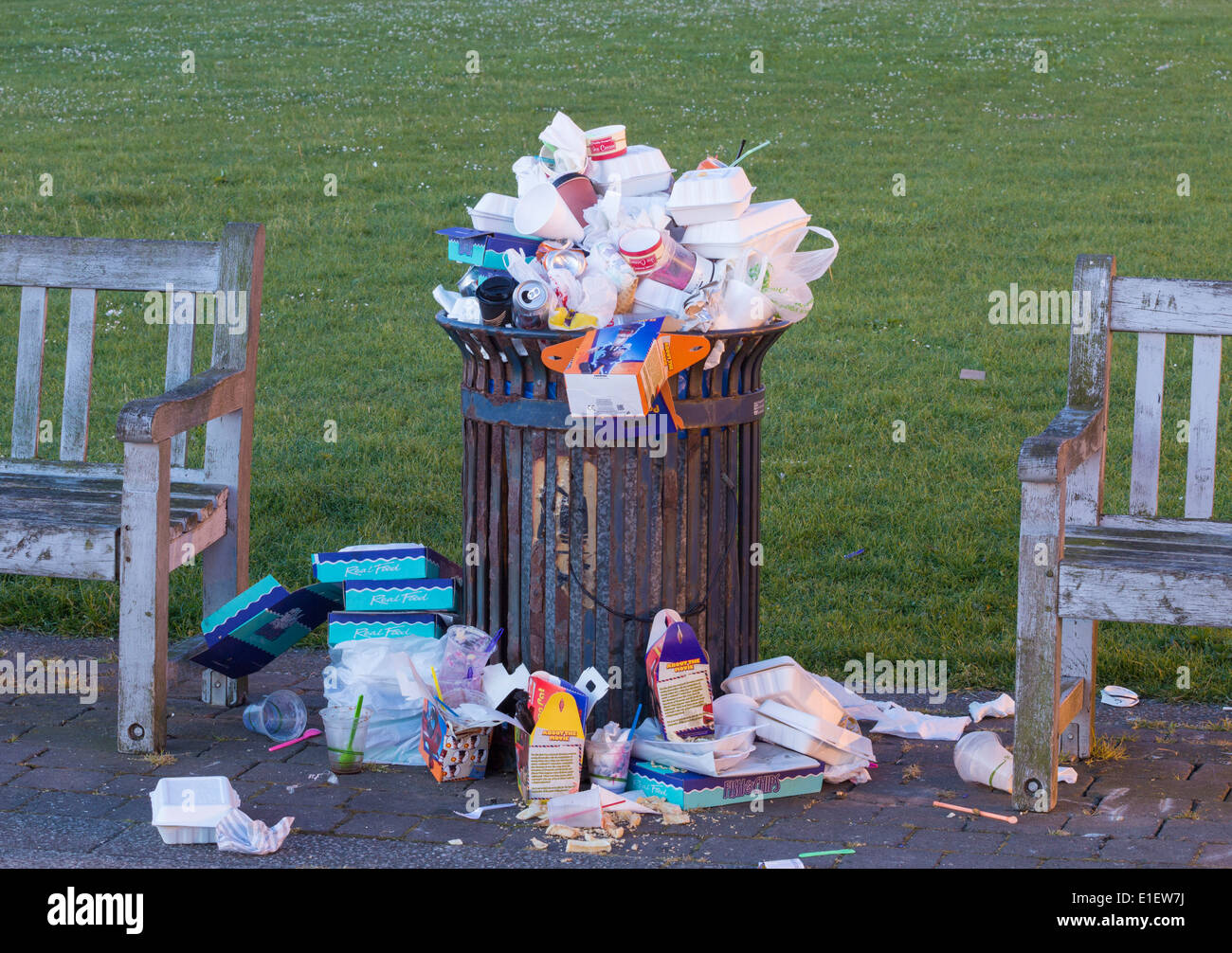 Coastal litter bin overflowing with plastic and styrofoam packaging ...