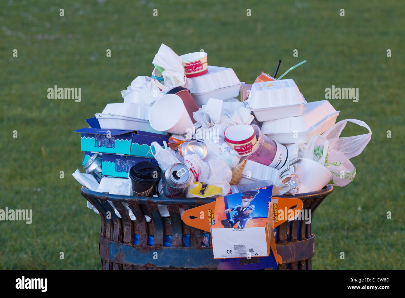 Coastal litter bin overflowing with plastic and styrofoam packaging ...