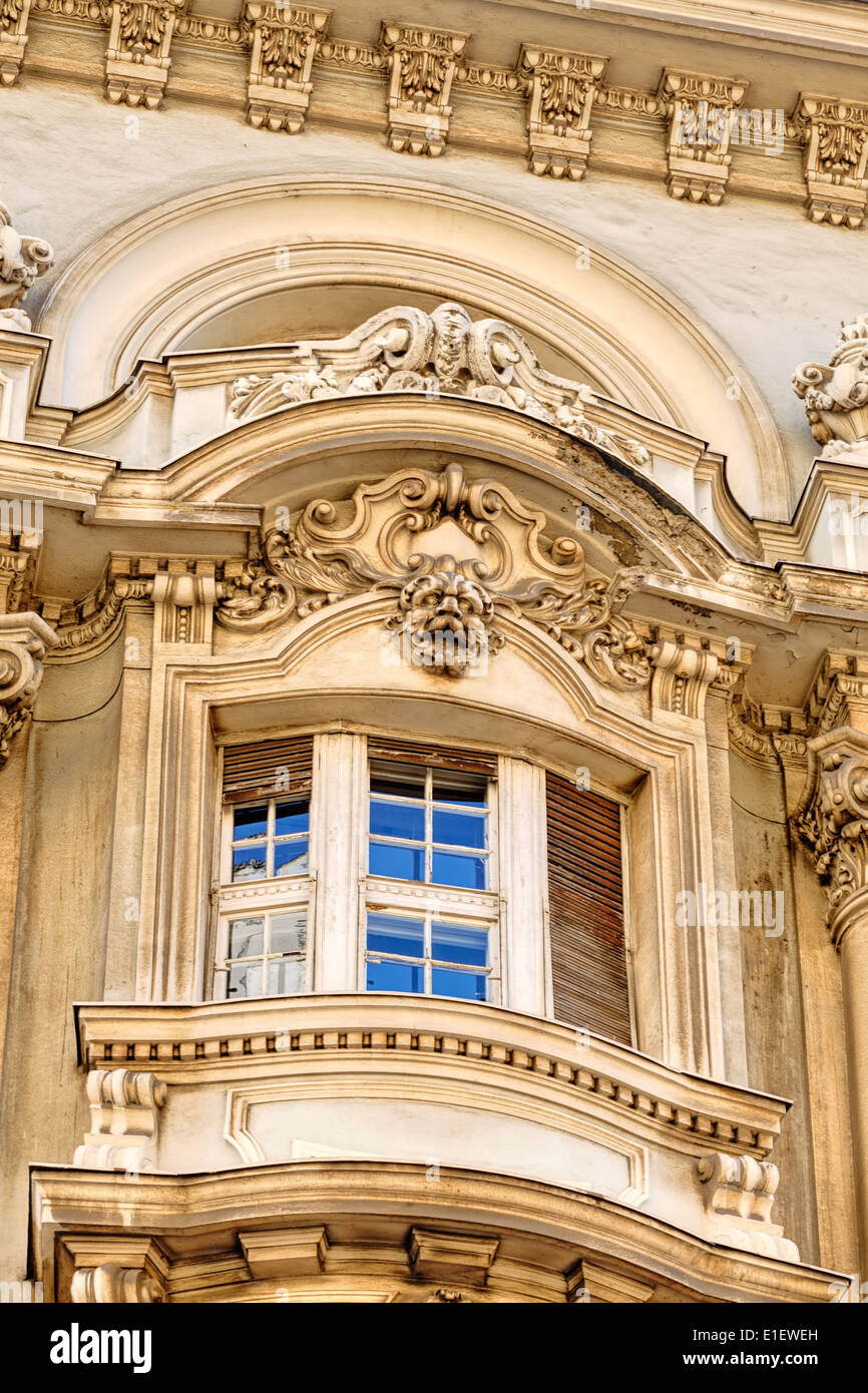 stone facade on classical building with ornaments and sculptures Stock ...