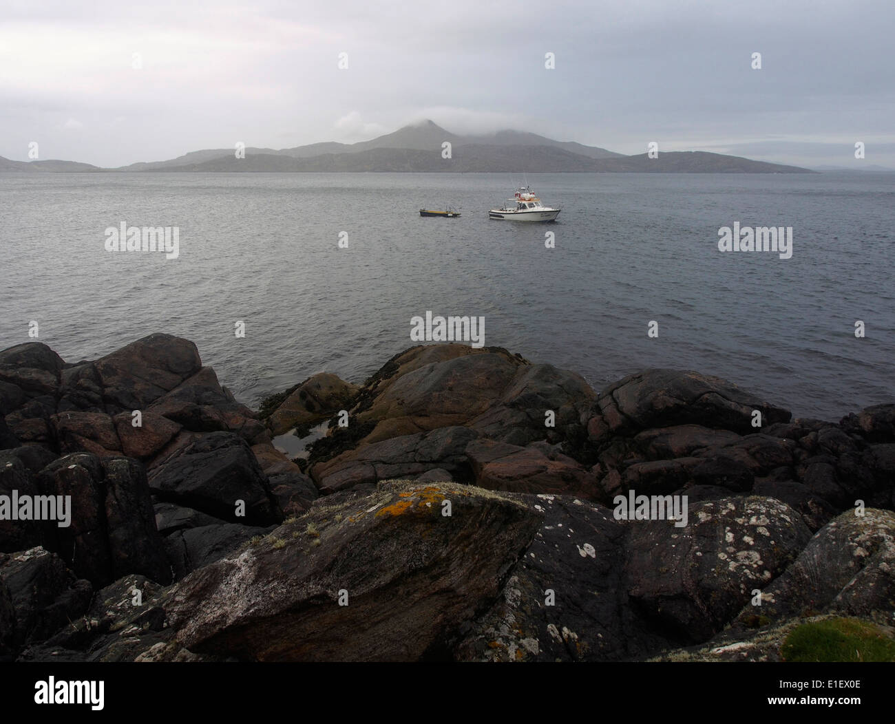 Boat 'Boy James' moored off Maol Domhnaich, Outer Hebrides, Scotland ...