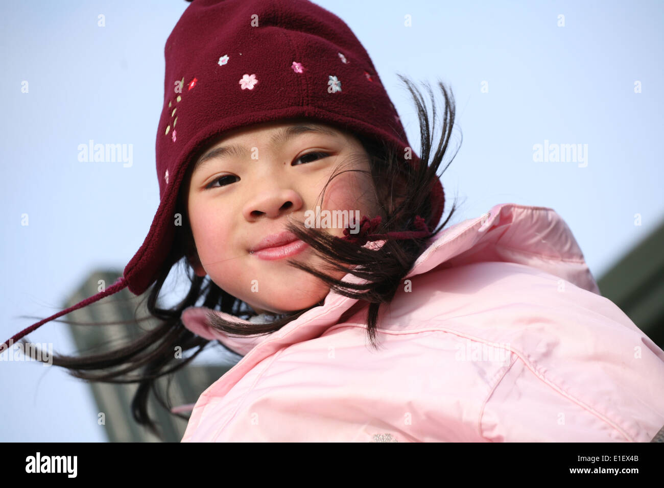 close up of chinese child head with hat Stock Photo - Alamy