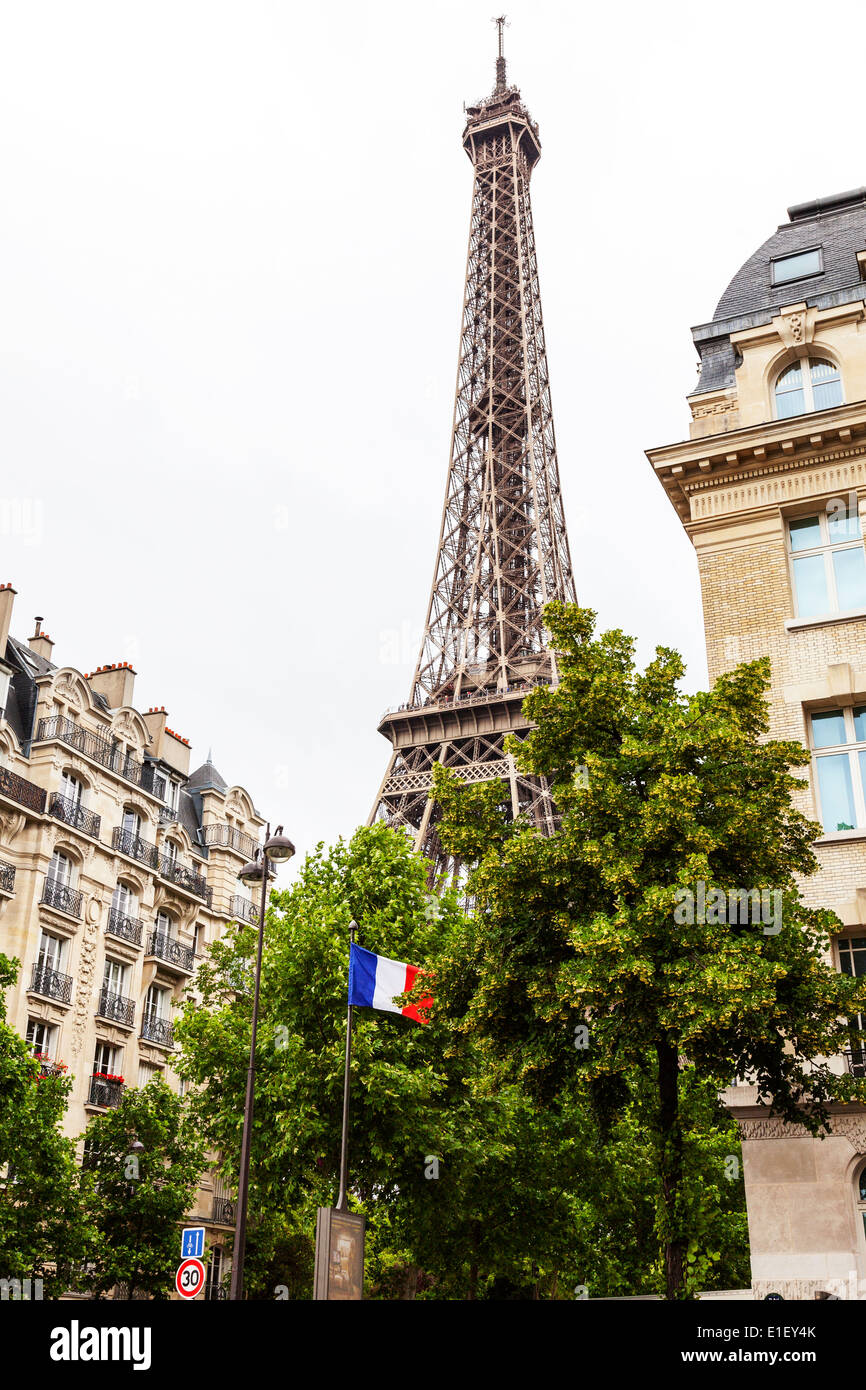 Eiffel Tower framed by residential buildings sign in Paris city europe ...