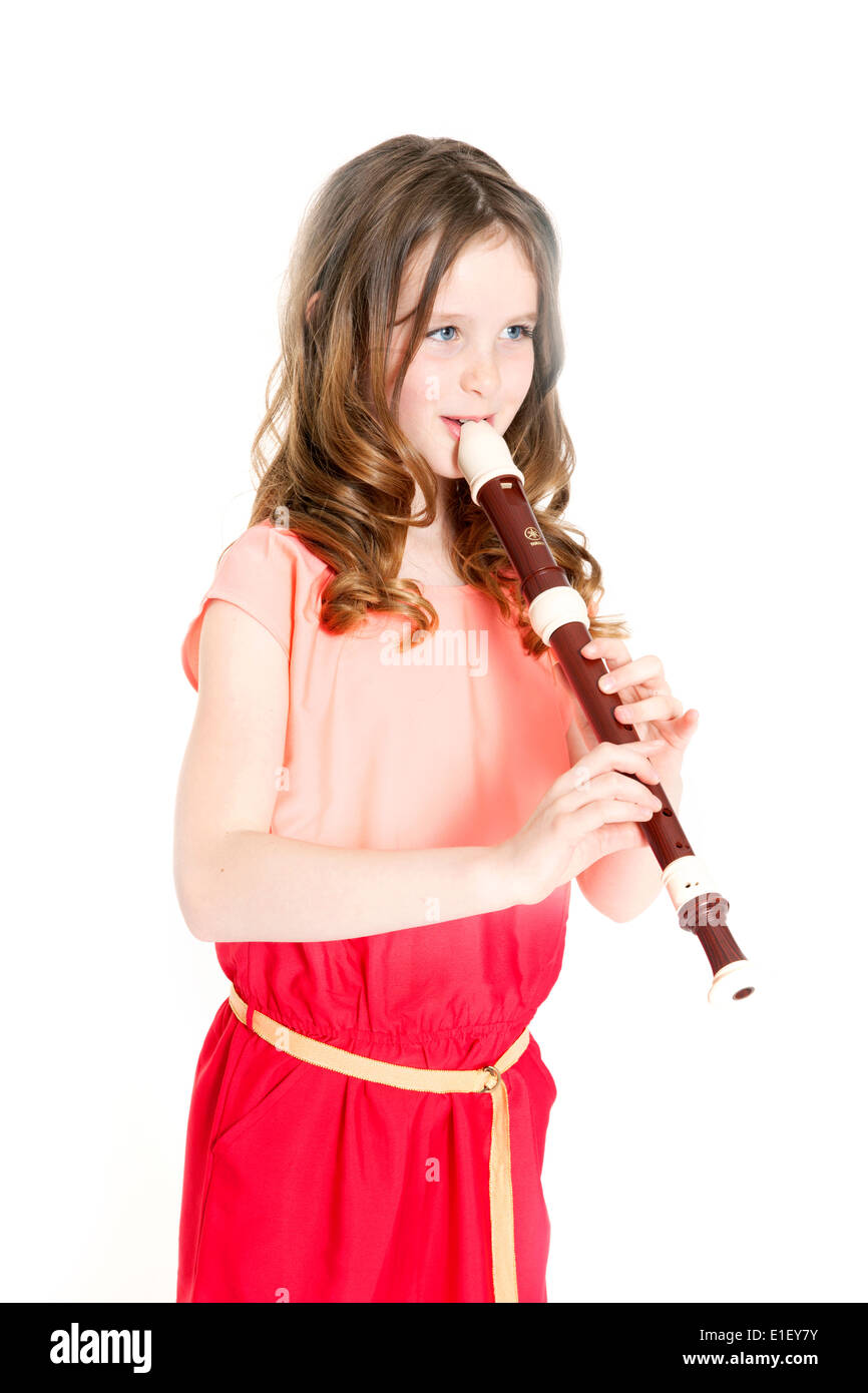 young girl with alto recorder and white background Stock Photo - Alamy