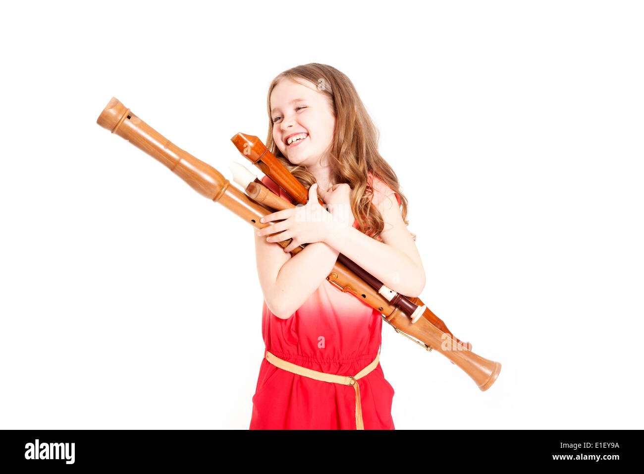 young girl with recorders and white background Stock Photo - Alamy